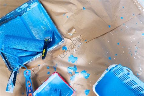 갈색 공예 종이에 파란색 페인트 얼룩이 있는 집 수리 도구 사진 사진 무료 다운로드 Lovepik