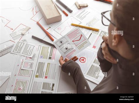 The Designer Develops Web Applications For Mobile Phones Sketch User Interface For Smartphones