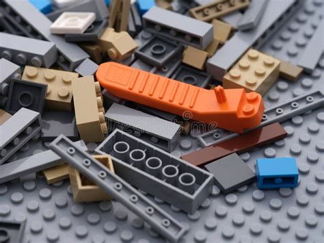 A Pile Of Lego Pieces With A Brick Separator In It Editorial