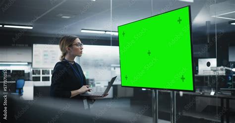 Portrait Of A Multiethnic Qa Engineer Working On Finding And Fixing