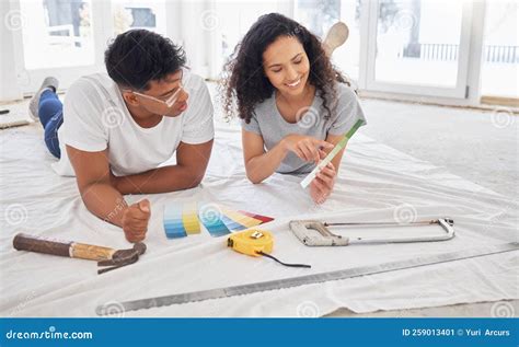 Were Updating Our Outdated Home A Couple Looking At Color Swatches