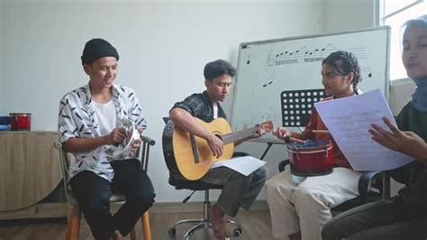 Asian Students Learning Together In Music Class People Stock Footage