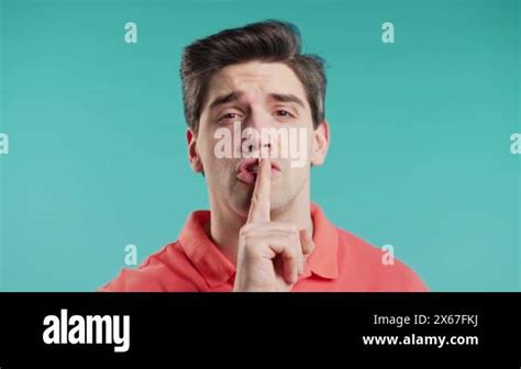 Handsome European Brunette Guy With Gesture Of Shhh Secret Silence
