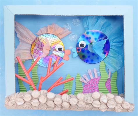 Two Colorful Fish In A Blue Frame With Corals And Seaweed On The Bottom