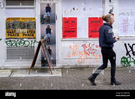 closed down retail space in soho where positive yet subversive posters