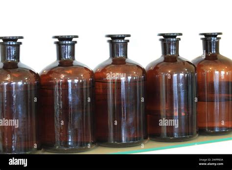 Chemical Reactants In Glass Capacities Stand On A Regiment In Chemical