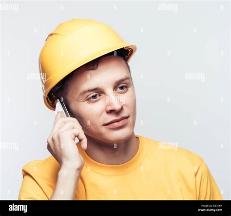 Male Worker Talking On Mobile Phone Stock Photo Alamy