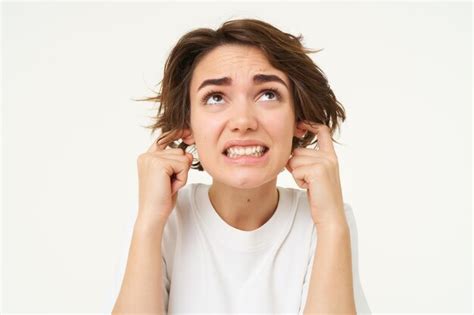 Premium Photo Portrait Of Young Woman Against White Background