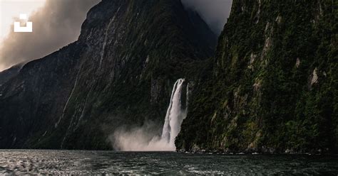 Low Angle Photo Of Waterfalls Between Mountains Photo Free Grey Image