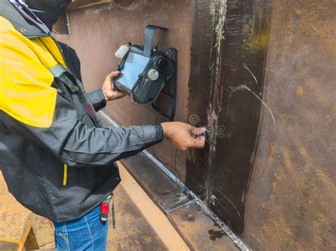 Inspectors Are Checking Defects In Welded Steel H Beam Add Joint With Process Ultrasonic Testing
