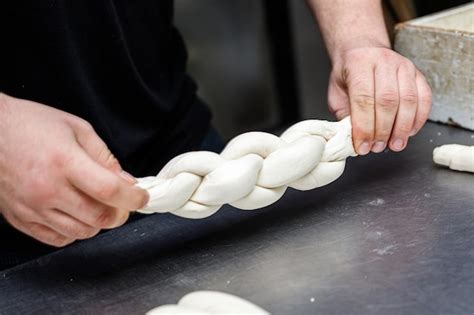 Premium Photo Making Braided Bread In A Bakery Traditional Shabbat
