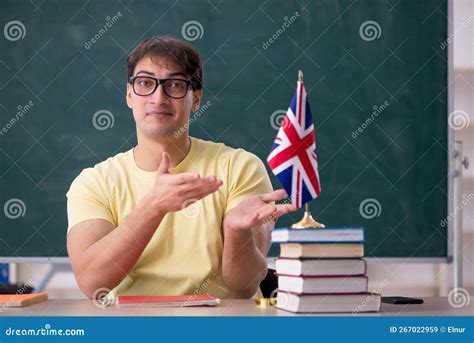 Young Male English Language Teacher In The Classroom Stock Image