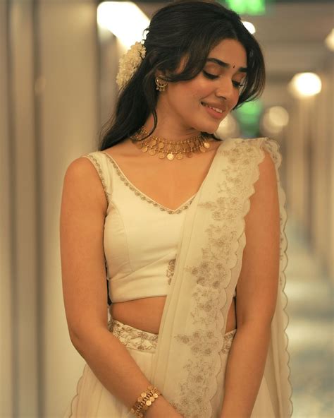 Krithi Shetty Gorgeous Photos In White Bralette Tops