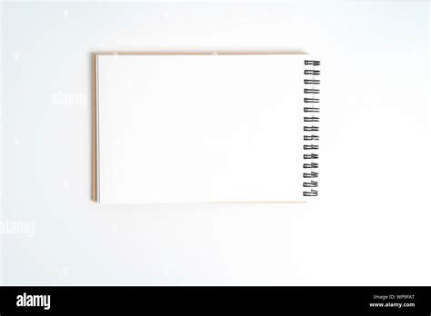 A Notebook On A Spring Isolated On White Background Stock Photo Alamy