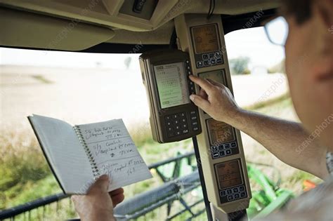 Farmer Using A Yield Monitor Stock Image C007 1053 Science Photo Library
