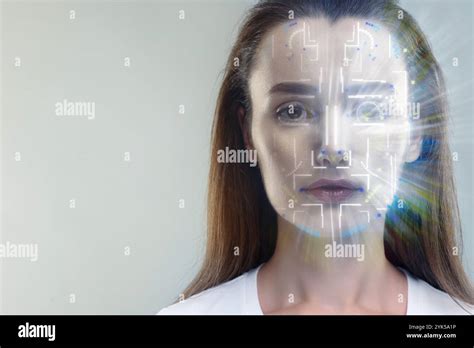 Facial And Iris Recognition System Woman Undergoing Biometric Verification On Grey Background