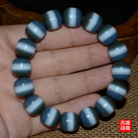 蓝沁是什么手串 天珠蓝沁怎么形成的 古珠的蓝芩 大山谷图库