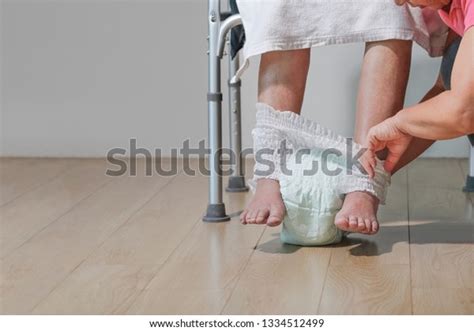 Elderly Woman Changing Diaper Caregiver Stock Photo Shutterstock
