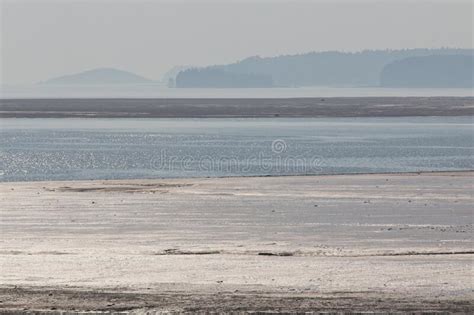 The Exposed Mud Flat Is Disappearing With The Rise Of The Tide Five Islands Nova Scotia