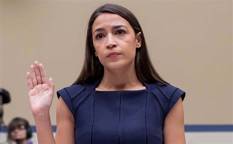Download Caption Alexandria Ocasio Cortez Raising Her Hand In