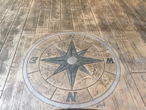 Compass Stamp With Custom Stain Palermo Concrete Inc
