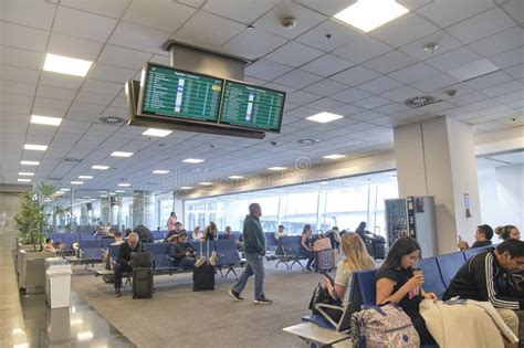 Boarding Area Of An International Airport Passengers And Information
