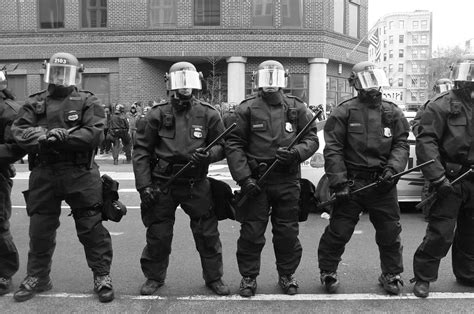 Riot Police Stand In Front Of Protestors At Trump Inaugura… Flickr