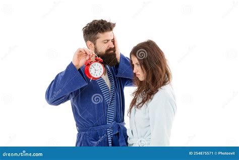 Waking Up By Alarm Clock Signal Pretty Woman And Bearded Man Holding Alarm Clock Early In The