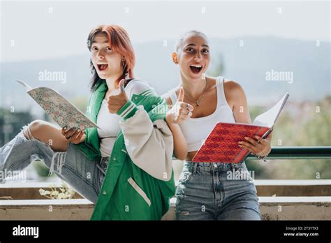 Studying Together High School Students Collaborating On Homework After