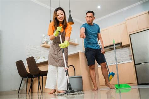 Premium Photo Asian Man Pointing At Dirty Spot On The Floor