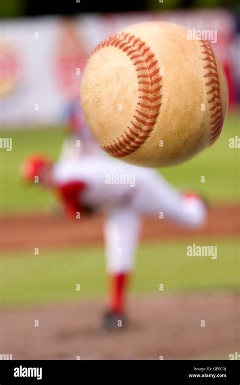 A Baseball Player Pitching With Spin On The Ball Motion Blur On Ball