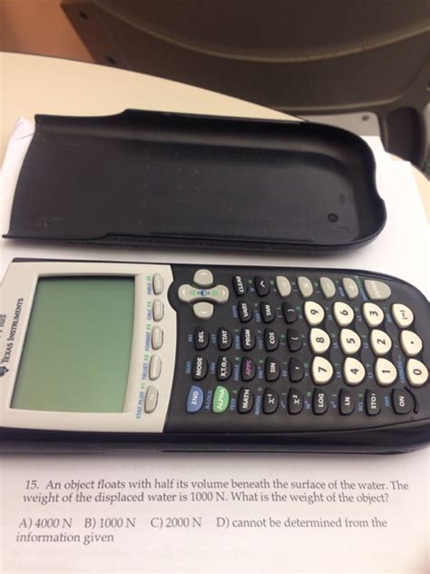 Solved An Object Floats With Half Its Volume Beneath The Chegg