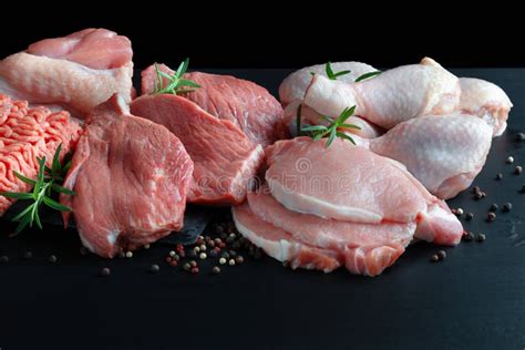 Different Types Of Raw Meat Beef Pork Lamb Chicken On A Wooden