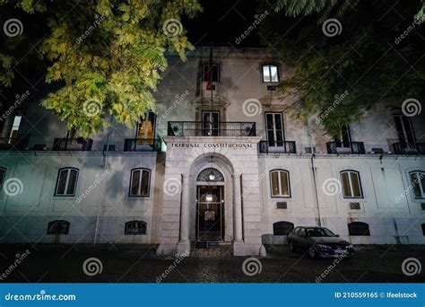 Man Facade Of Tribunal Constitutional Building With One Working Late