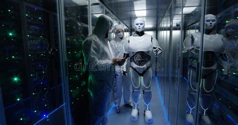 Engineers Testing On Robot Controls Inside The Laboratory Stock Image