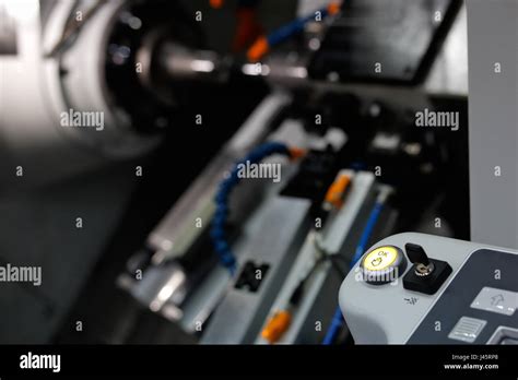 Close Up Of Cnc Turning Lathe Machine Selective Focus On Ok Push