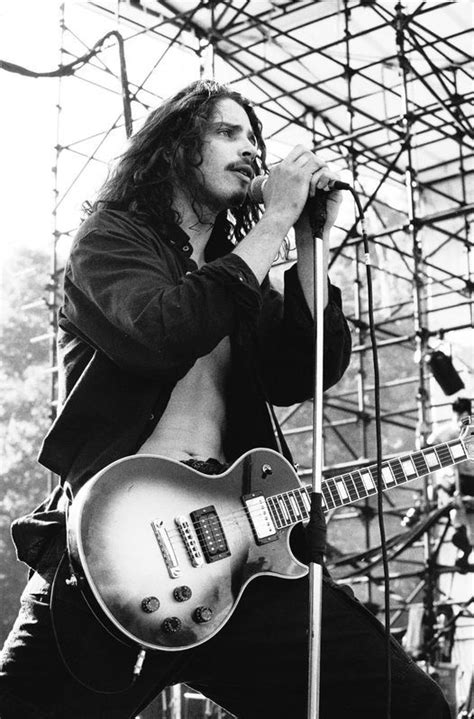 Chris Cornell Holding The Mic On Stage Soundgarden Live At 1992