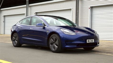 Autofile News Tesla Promises Record Production