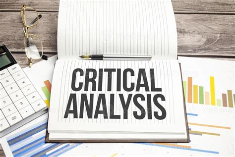 Critical Analysis On Notepad And Charts With Calculator 11649290 Stock