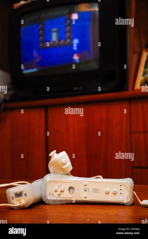 Retro Gaming Setup With Crt Tv And Classic Game Console Controllers