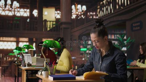 Teacher Preparing Class Notes And Learning Materials For A Teaching