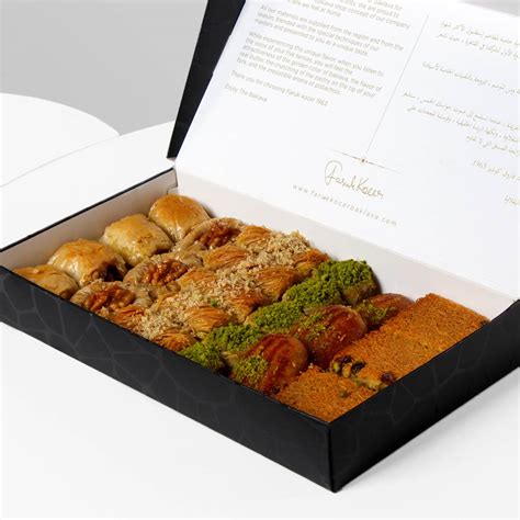 Patchi Tin Box Of 22 Pieces And 9 Red Roses Greater Cairo Flowrista