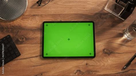 Top Down View Of A Tablet Computer With Mock Up Green Screen Display Static Footage Of A Device
