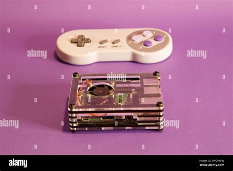 Nintendo Type Video Game Contollers And A Raspberry Pie Computer On A