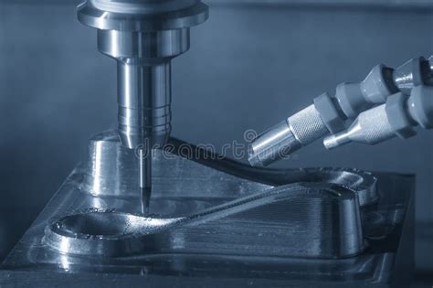 The Cnc Milling Machine Cutting Mold Part By Solid Ball Nose End Mill Tool In The Light Blue