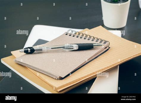 Pen And Notebook Up Close On An Office Desk Stock Photo Alamy