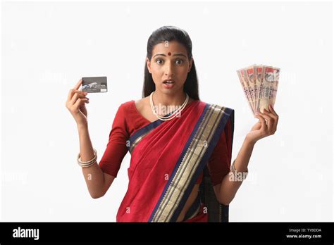 Indian Woman Showing Thousand Rupees Banknotes With Credit Card Stock Photo Alamy