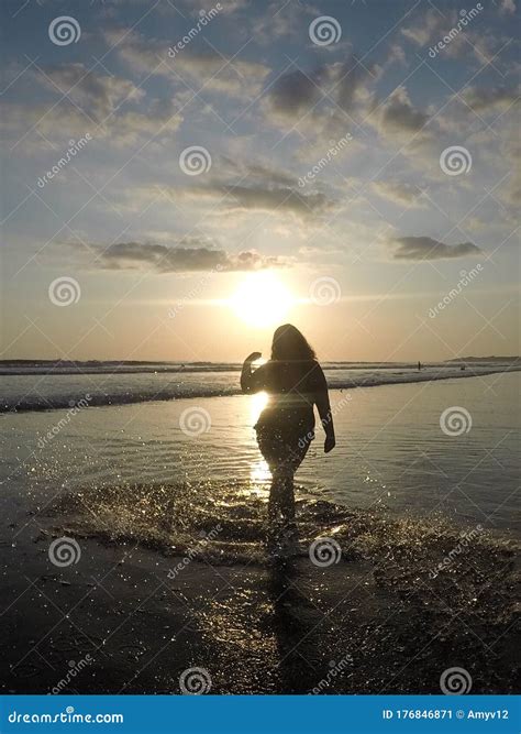 Curvy Female In The Sunset On The Beach Stock Image Image Of Spashing Strong