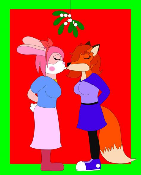 Valerie And Lily Kissing Under The Mistletoe At By