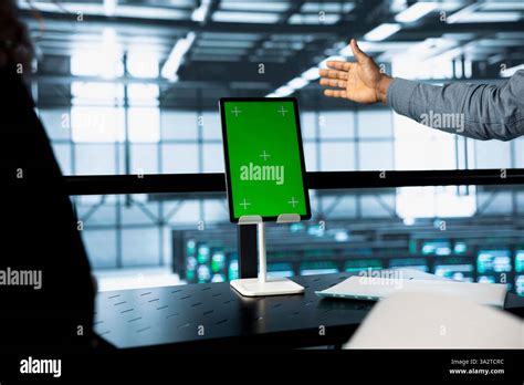 Engineers Using Isolated Screen Tablet In Data Center Managing Server Virtualization Workers